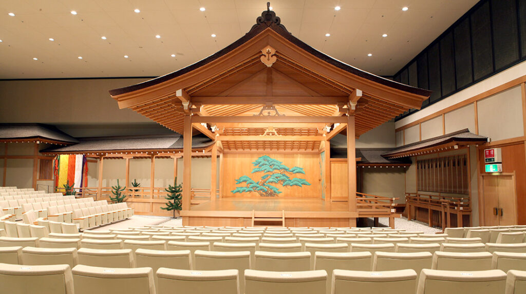 Noh actors move in a distinctive way, wearing white tabi, and suriashi